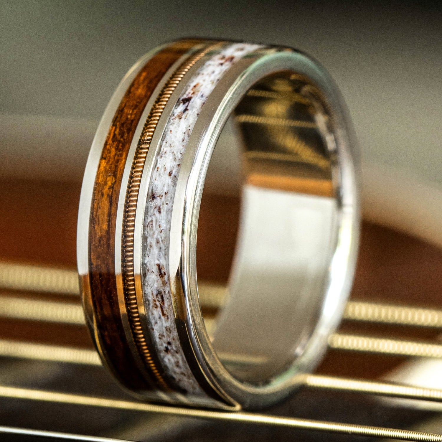 The Pioneer | Men's Gold Wedding Band with Guitar String, Antler & USS ...